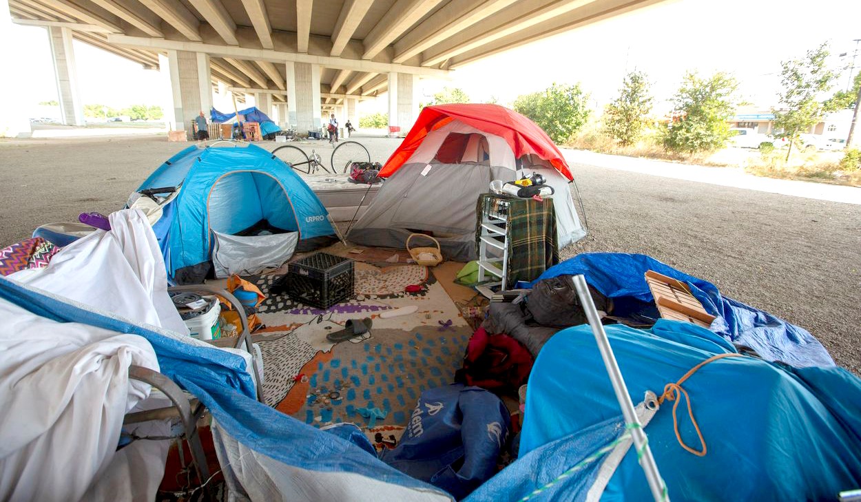 Governor: TxDOT can remove homeless camps from Austin's highway ...